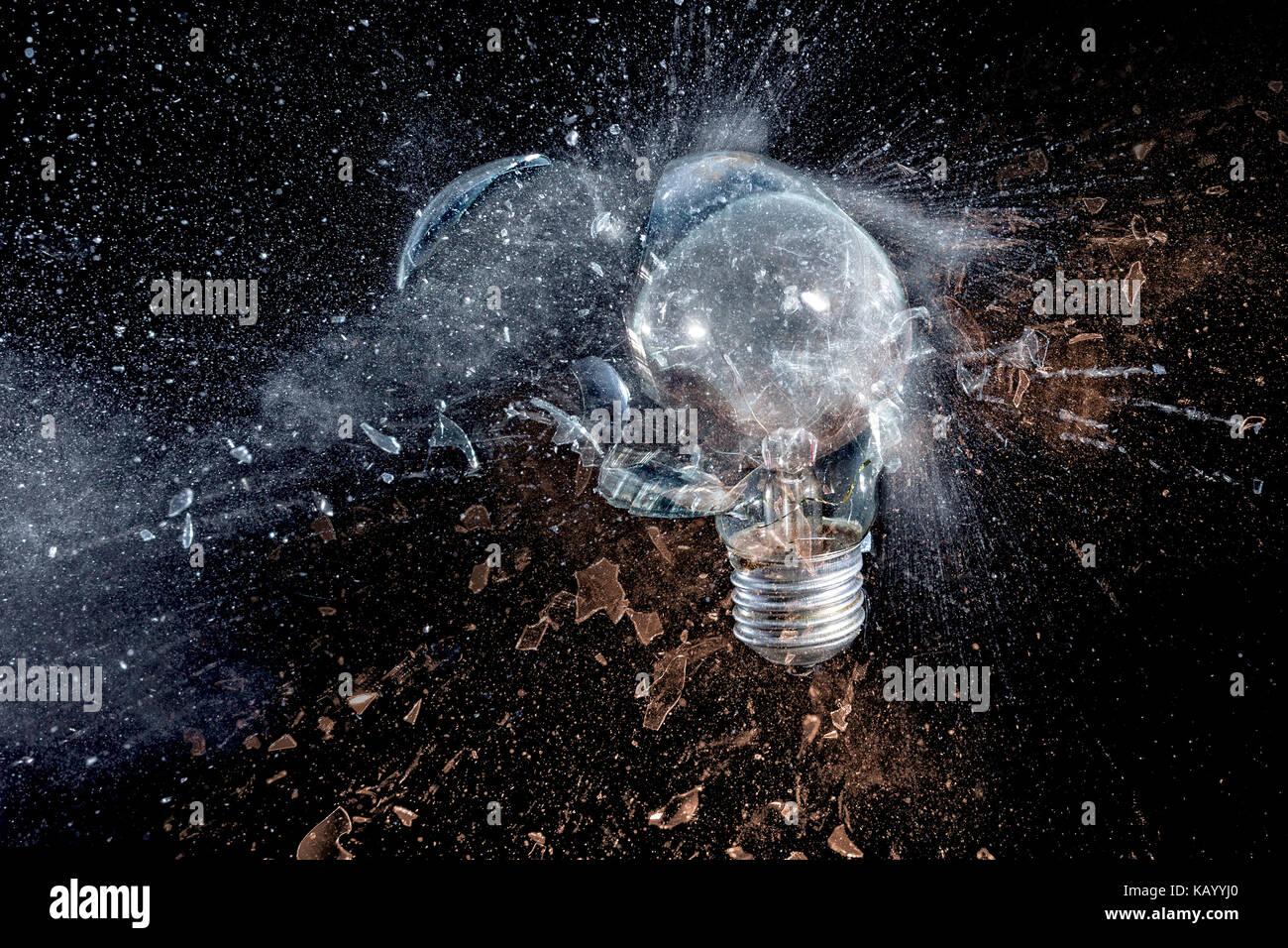 glass bulb explosion on black background Stock Photo - Alamy