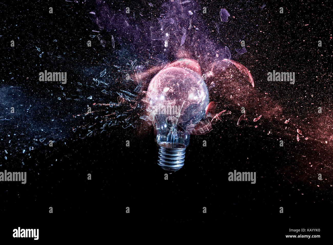 glass bulb explosion on black background Stock Photo - Alamy