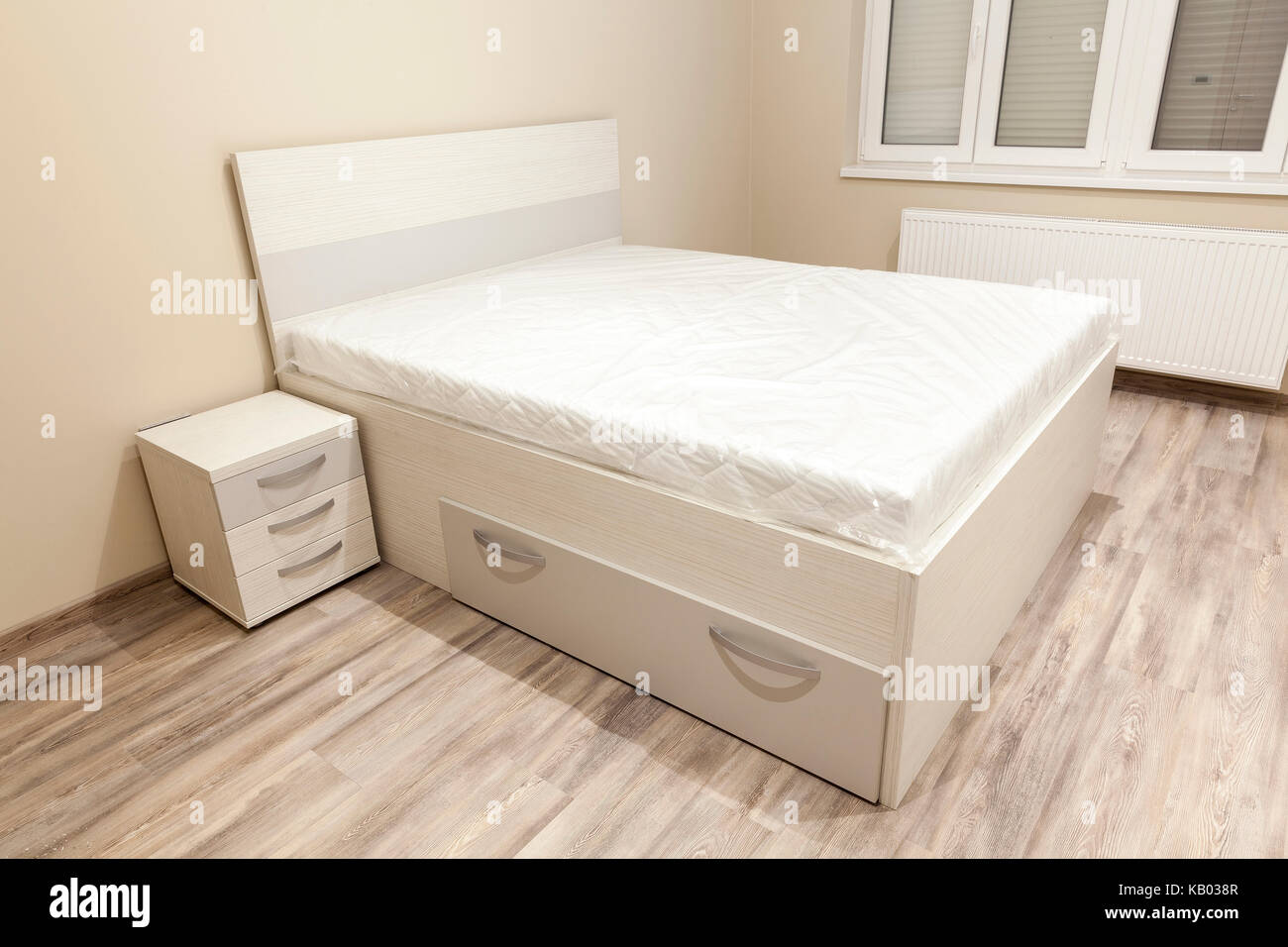 bedroom with empty new bed Stock Photo - Alamy