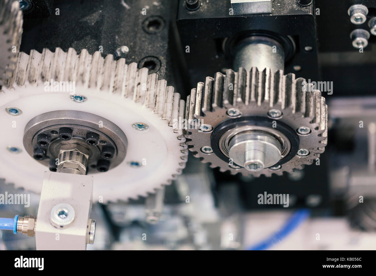 rotating gears on machine for printing Stock Photo - Alamy