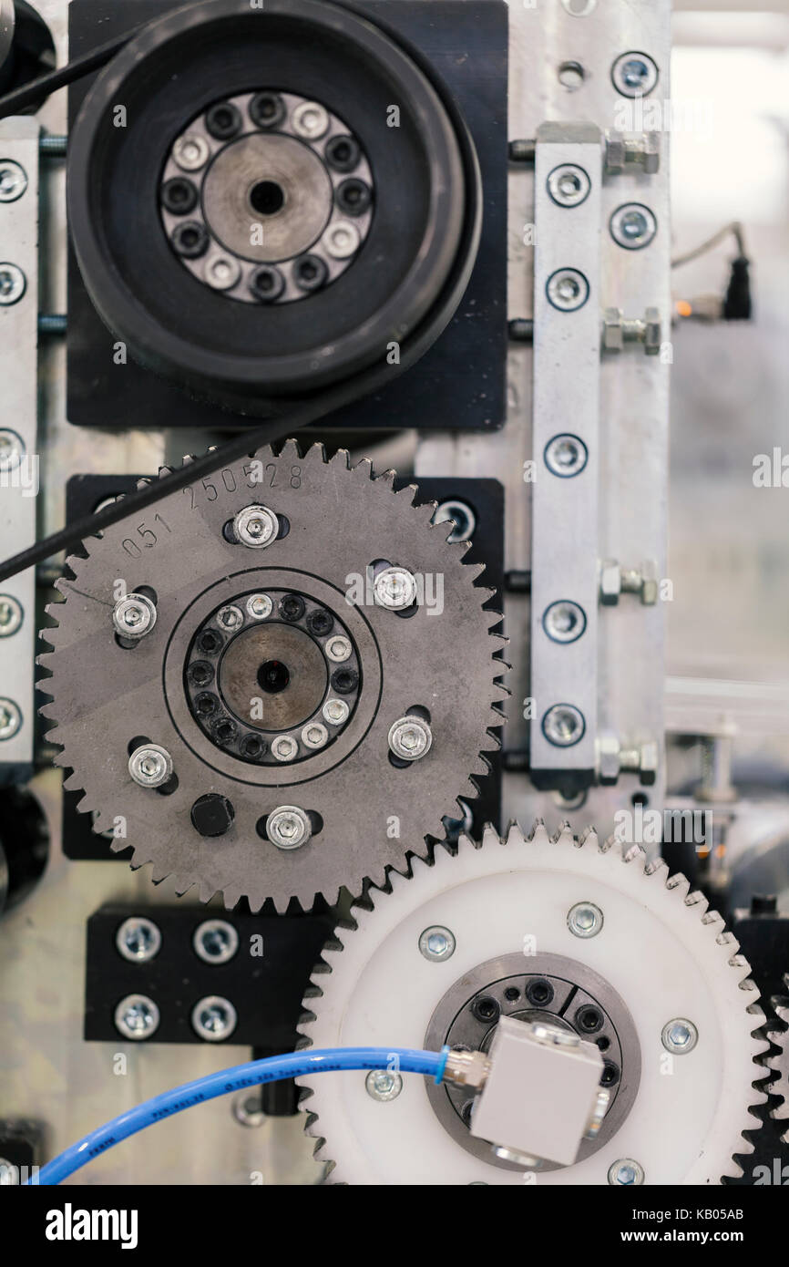rotating gears on machine for printing Stock Photo - Alamy