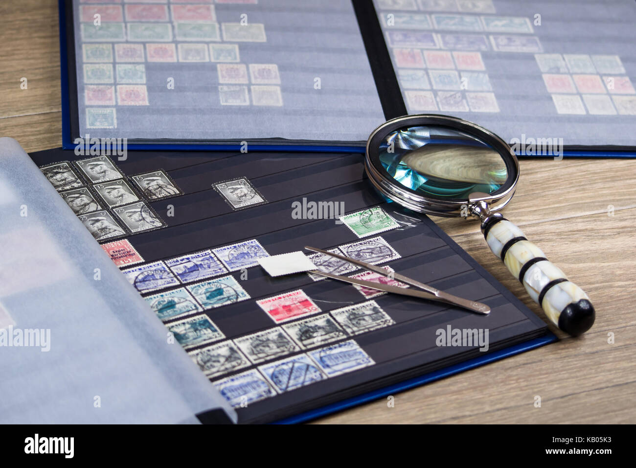 Stamps magnifying glass hi-res stock photography and images - Alamy
