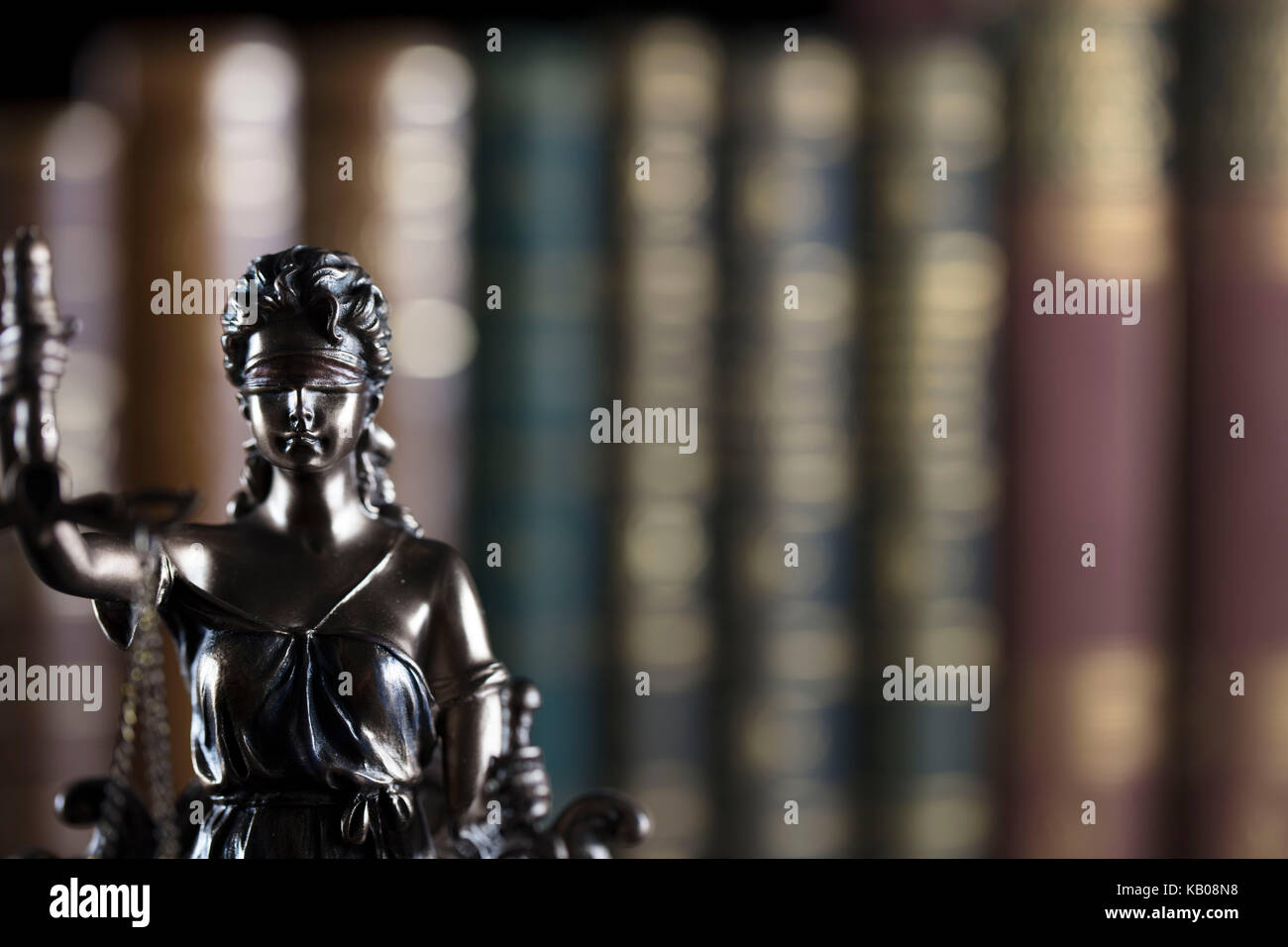 Law symbol - Themis, books and scale. Place for typography Stock Photo ...