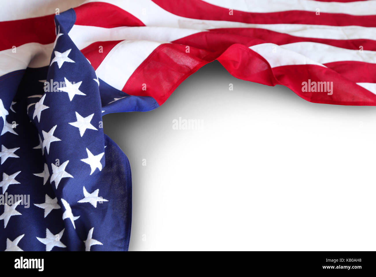 Closeup of American flag on plain background Stock Photo - Alamy