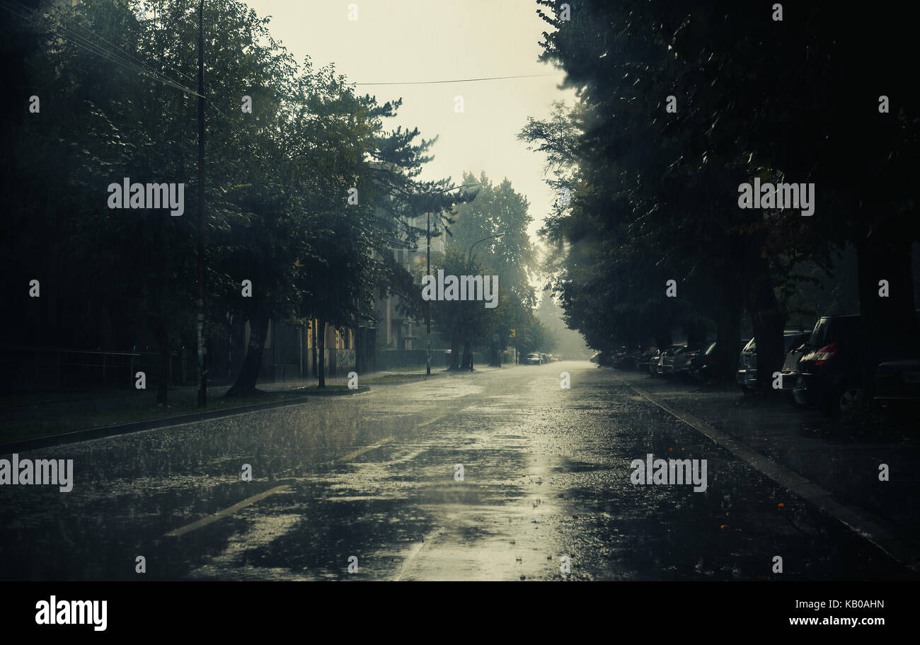 Heavy autumn rain in small Balkan town, weather moments Stock Photo - Alamy