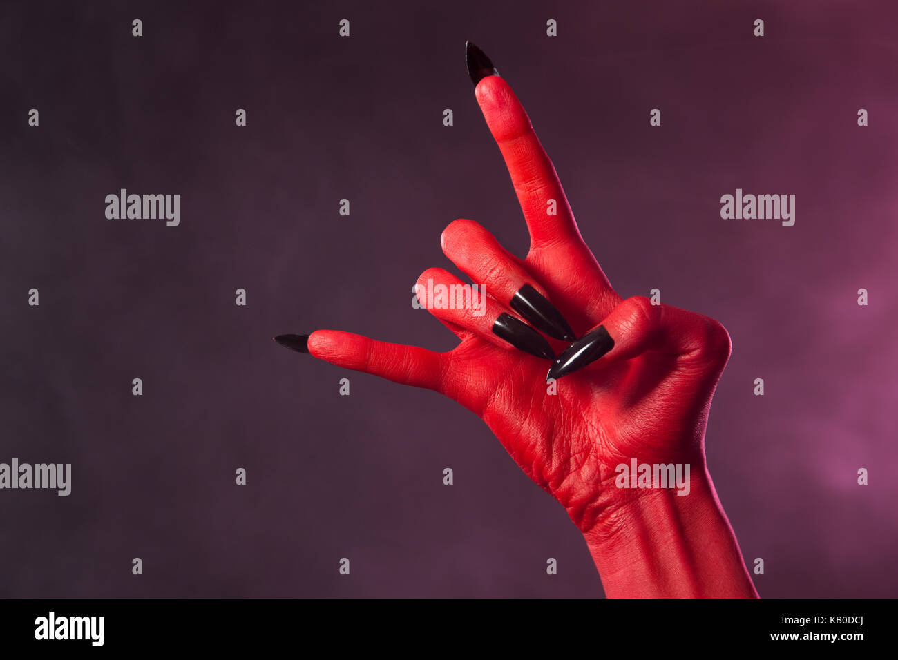 Devil hand sign hi-res stock photography and images - Alamy