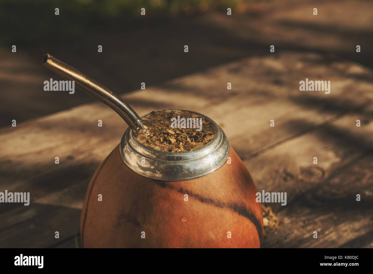 Close-up shot of Argentinean yerba mate drink in traditional calabash ...
