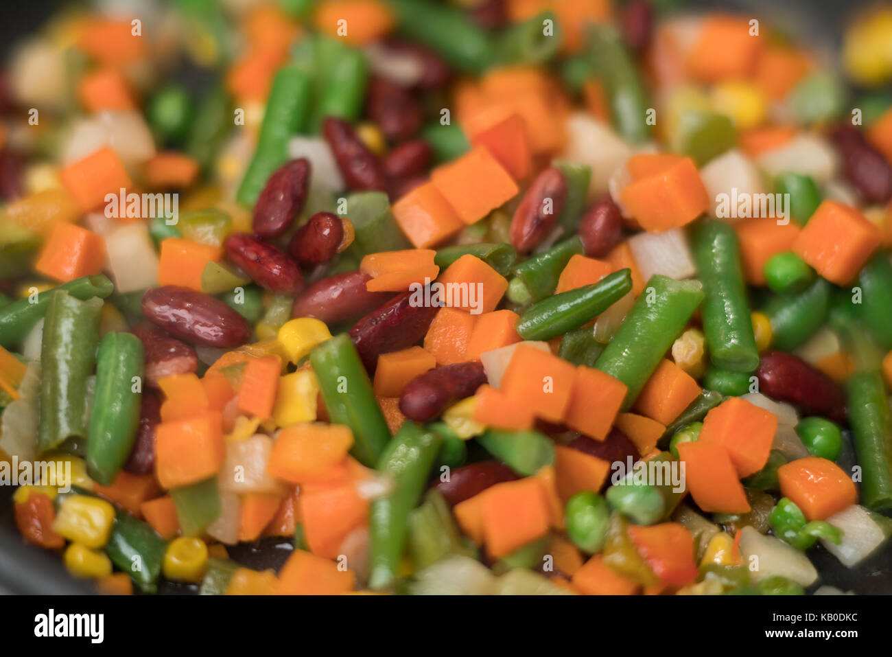 Texture of fresh tasty diced vegetables – beans, carrot, corn, pepper ...