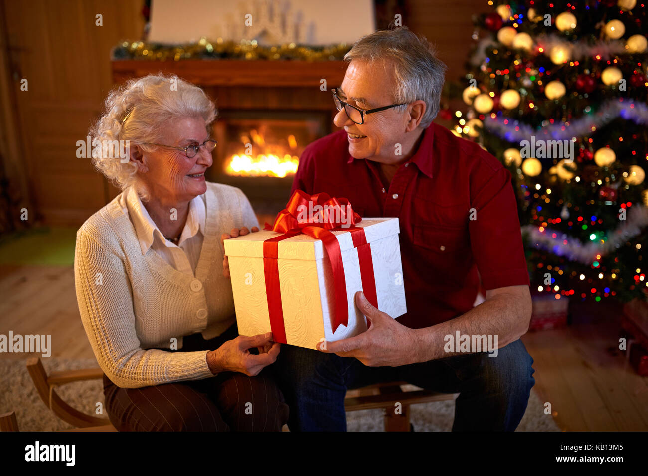 Grandparents hold hi-res stock photography and images - Alamy