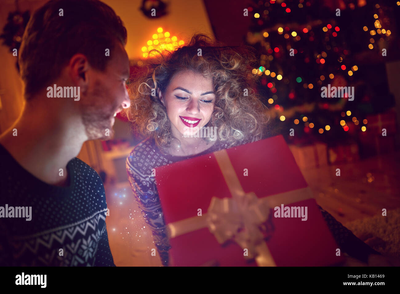 Magic surprise in box for young woman Stock Photo - Alamy