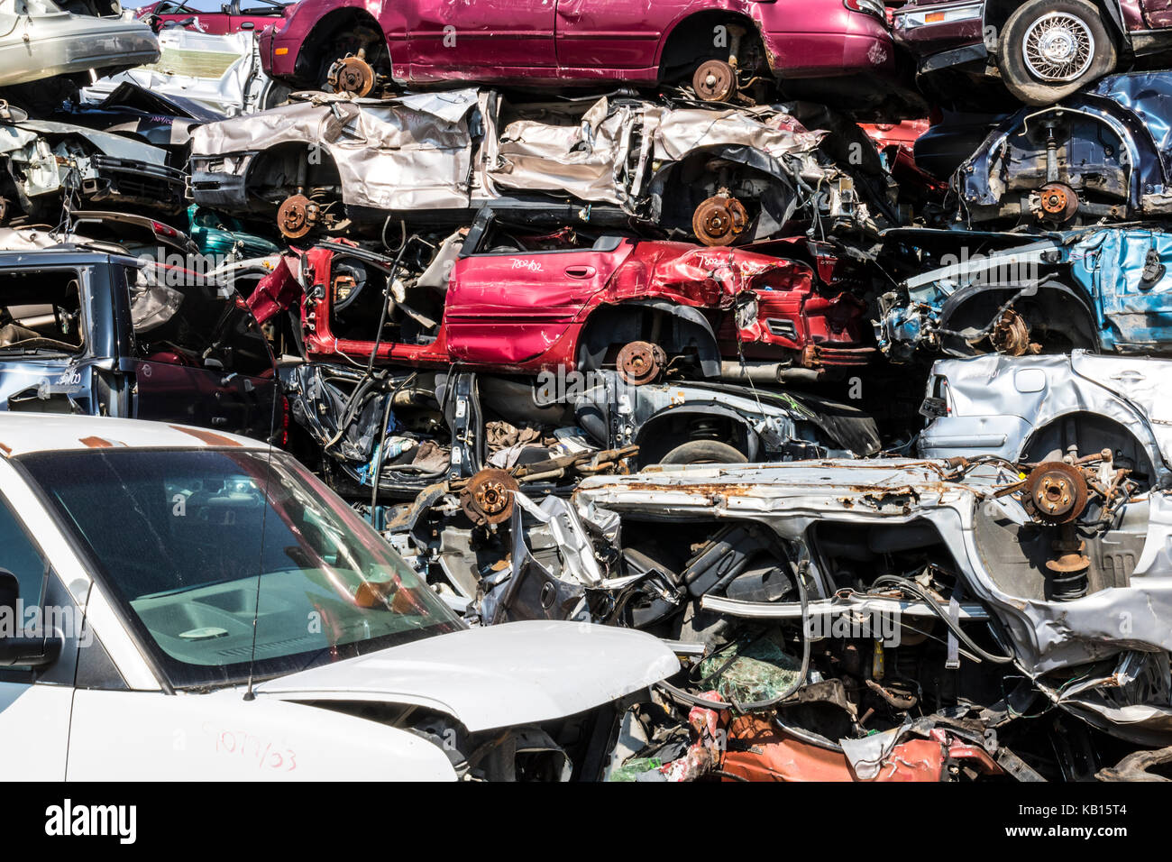 Indianapolis - Circa September 2017: Stacked junk yard clunker cars ...