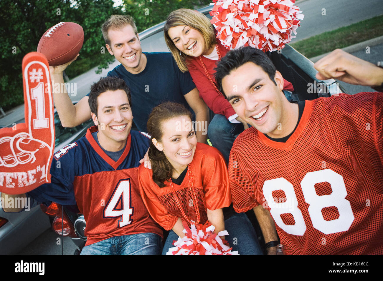 Group of friends at a football tailgating party outside Stock Photo - Alamy