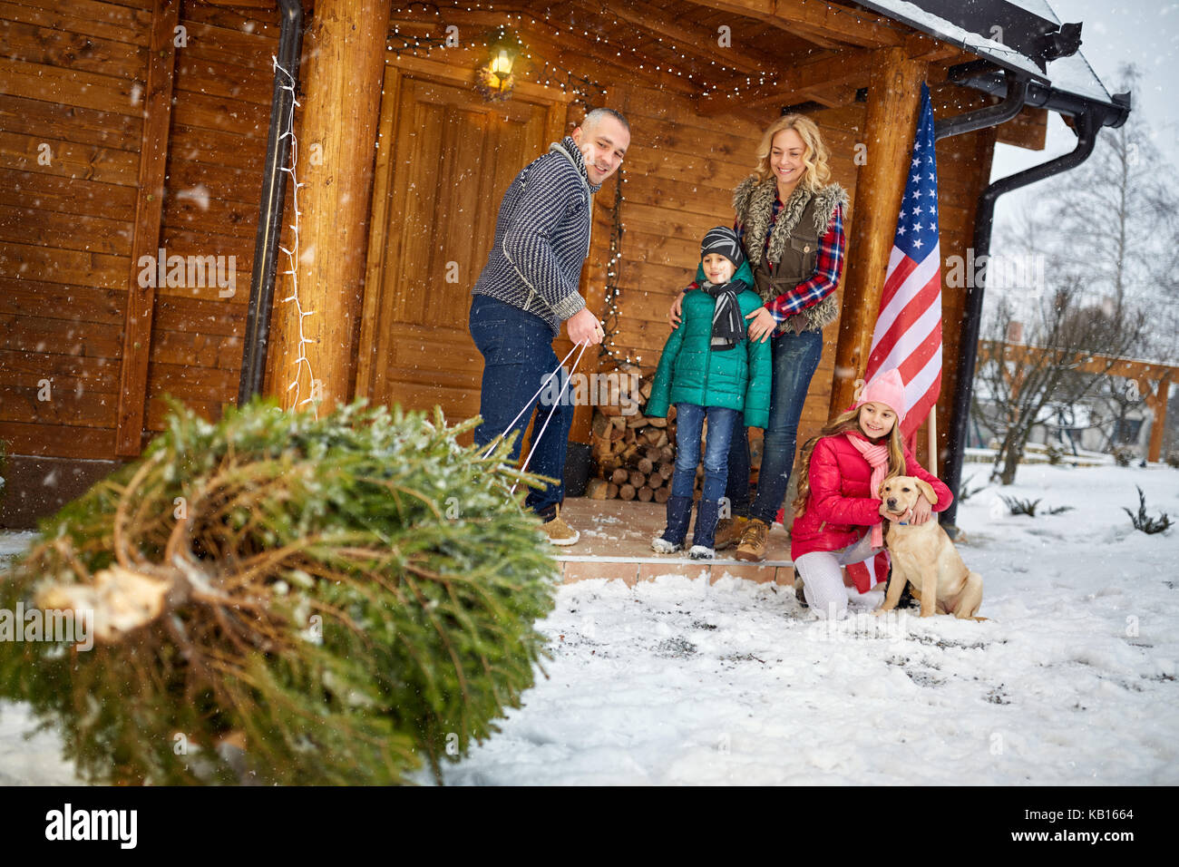 Christmas family. Happy Smiling Family at home celebrating Stock Photo ...