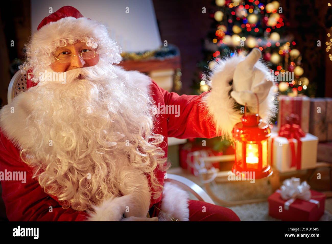 Portrait happy santa claus sitting hi-res stock photography and images ...