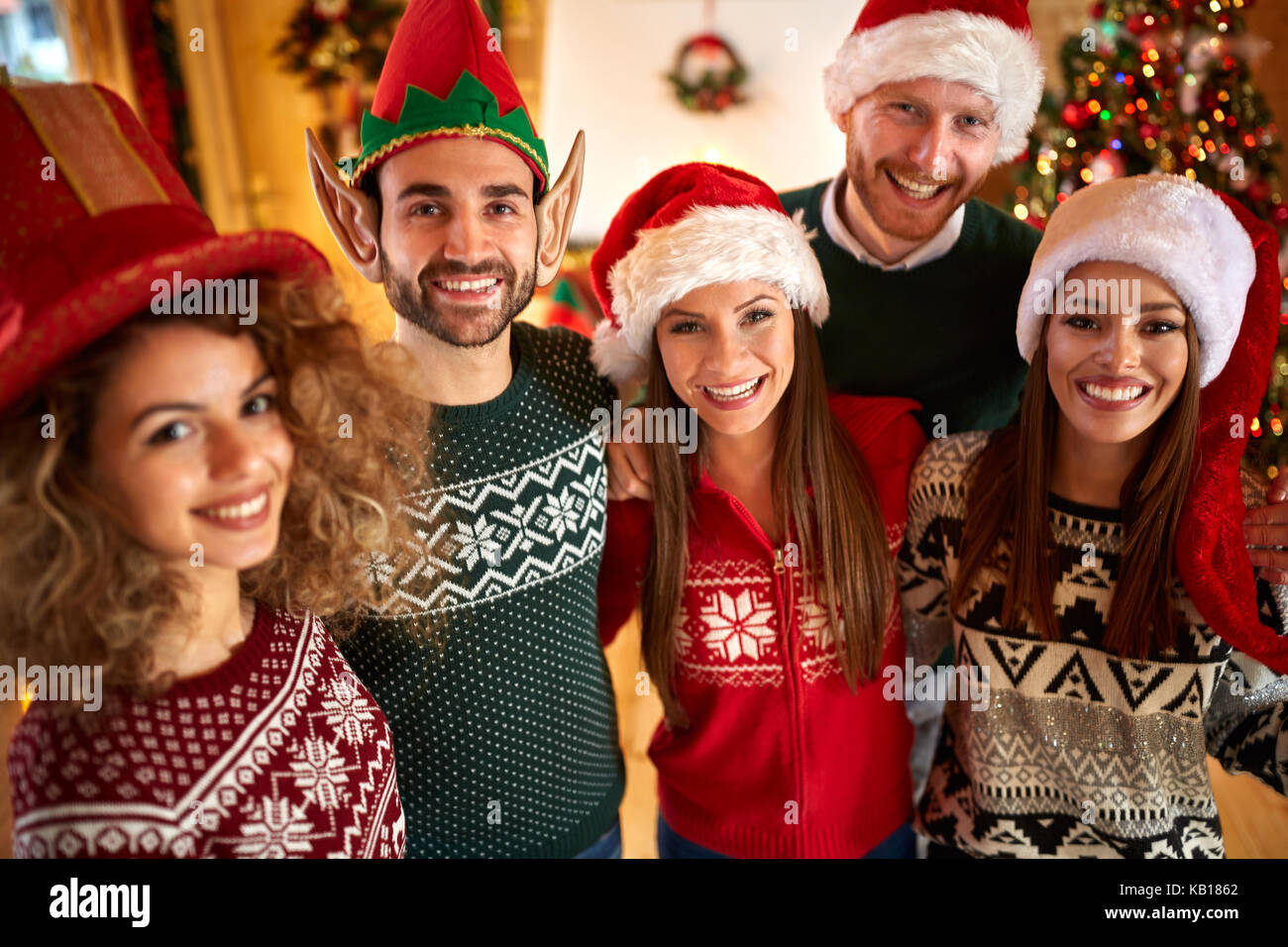 Cheerful friends makes fun on Christmas holyday Stock Photo - Alamy