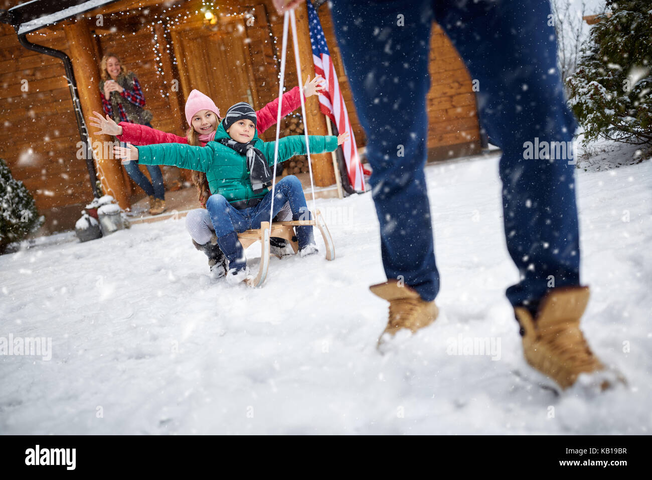 Kids play on ice slide hi-res stock photography and images - Alamy