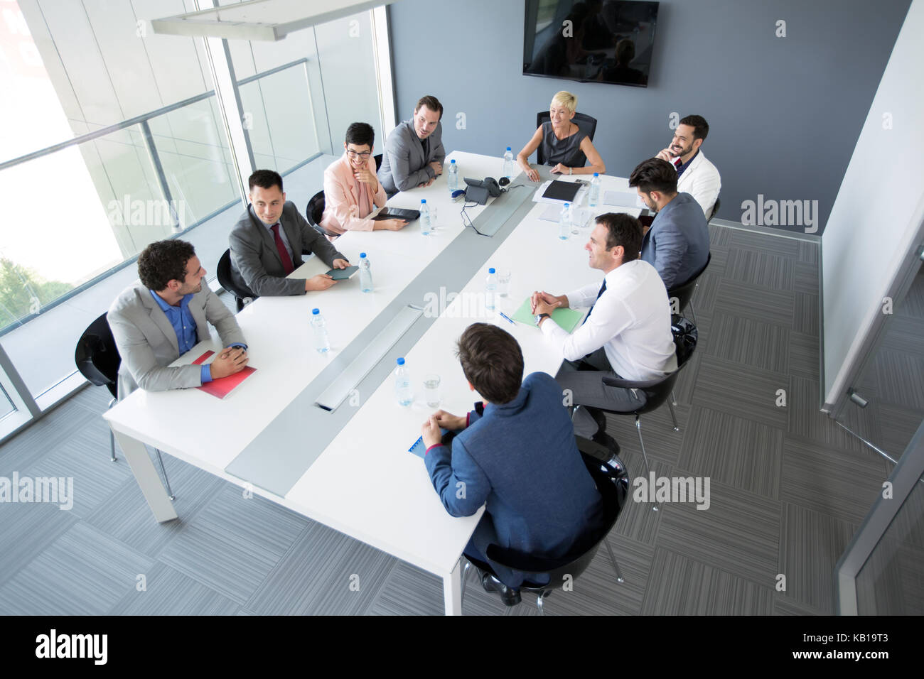 Group of business people having a business meeting in office Stock ...