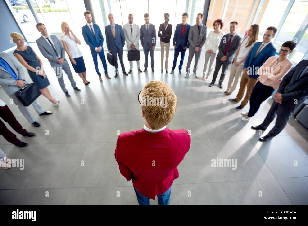 Young ambitious manager hold speech Stock Photo - Alamy
