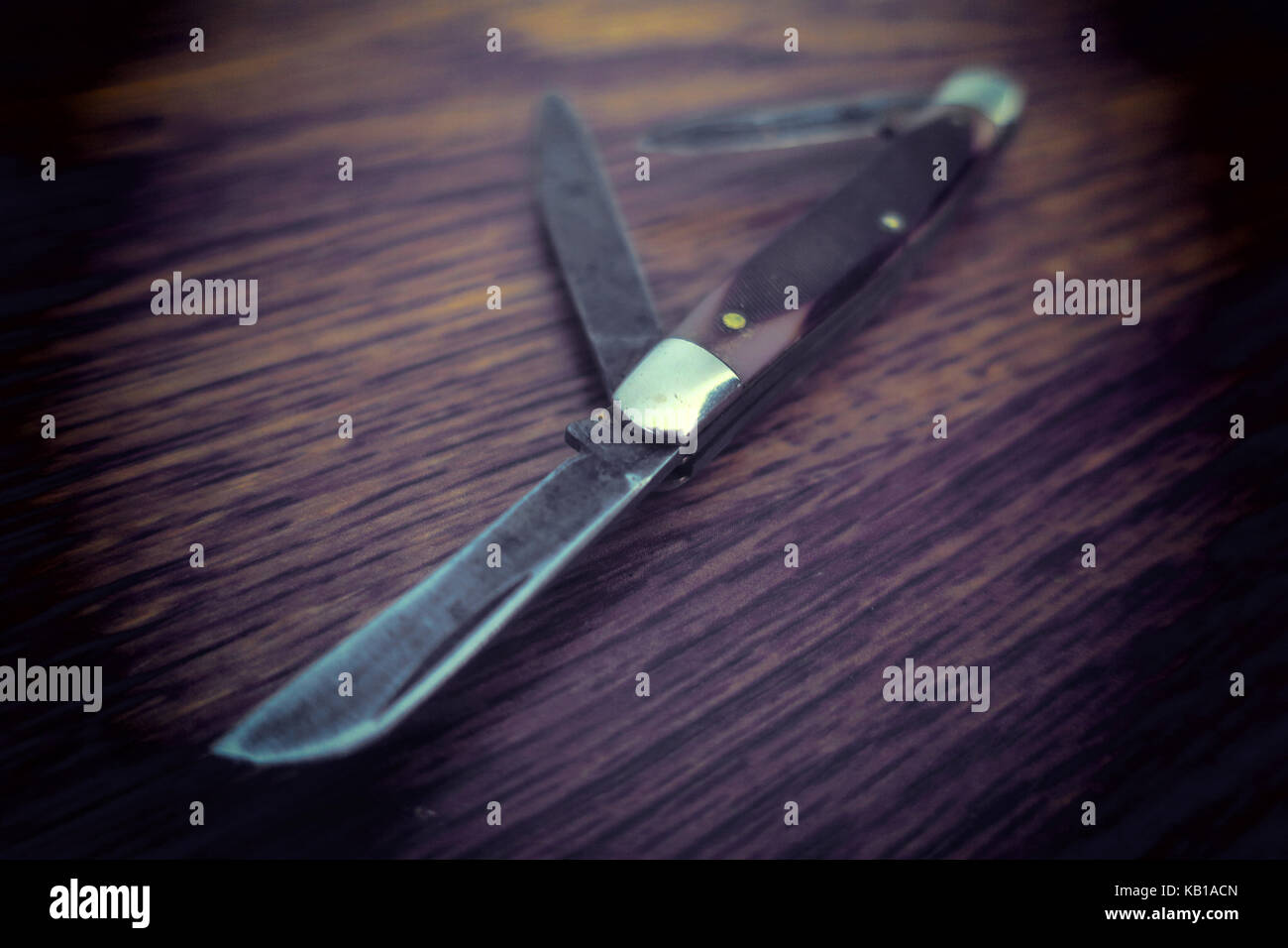 A vintage grungy knife blades on a table Stock Photo - Alamy