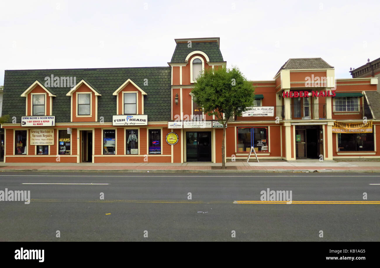 An old fashioned town business row Stock Photo - Alamy