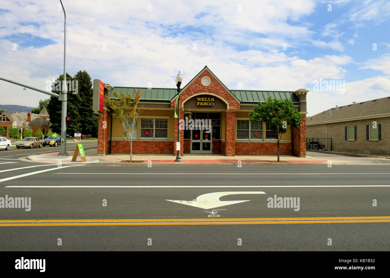 A small wells Fargo bank on a bright blue sky Stock Photo - Alamy