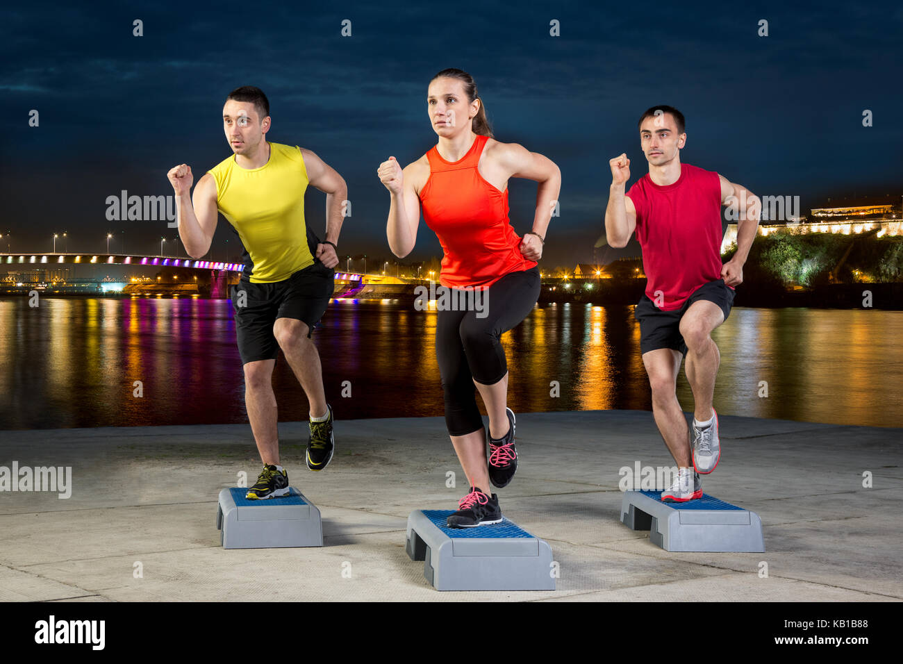 three young people on power step training, outdoor Stock Photo - Alamy