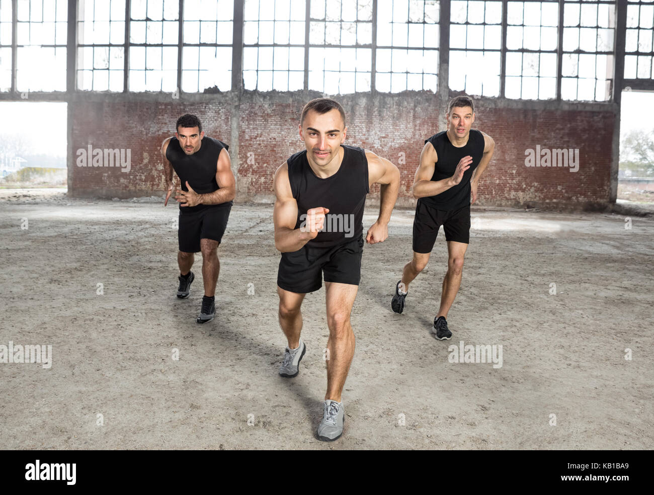 Young men doing exercise Stock Photo - Alamy