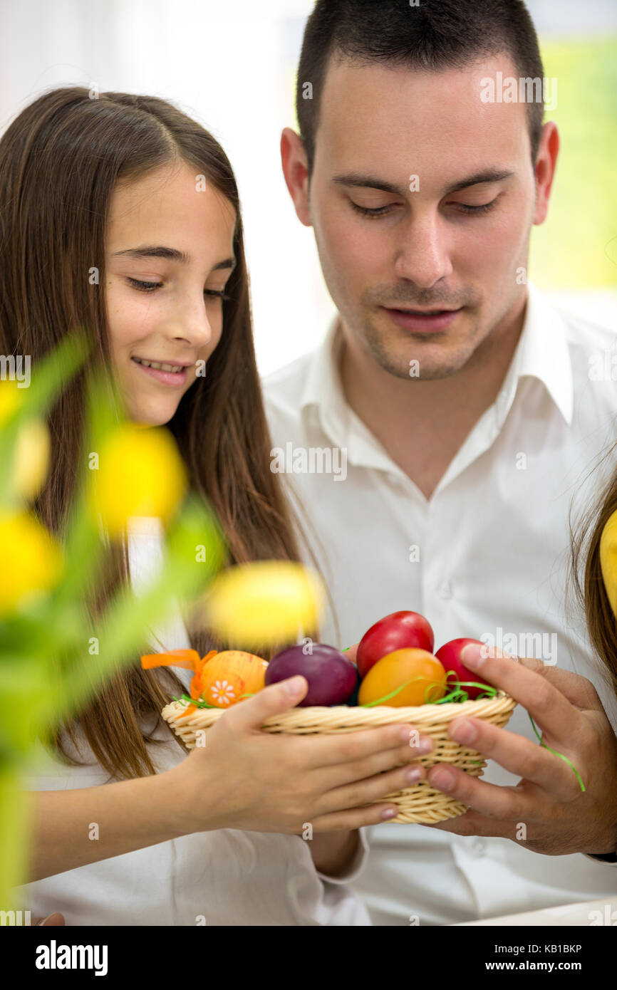 Father and daughter with colorful Easter eggs Stock Photo - Alamy