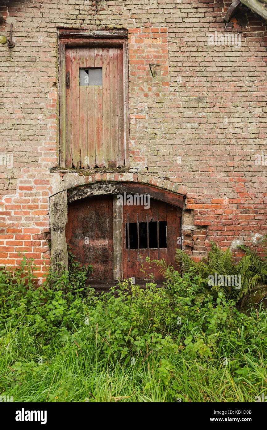 old derelict barn gable doors Stock Photo - Alamy