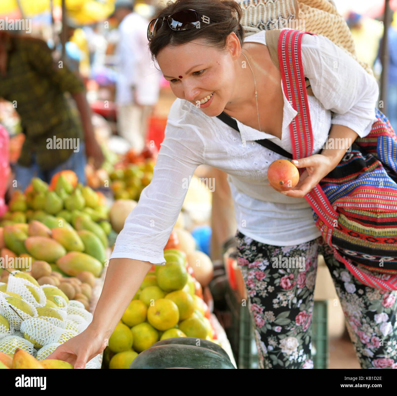 woman choosing fresh fruits Stock Photo - Alamy