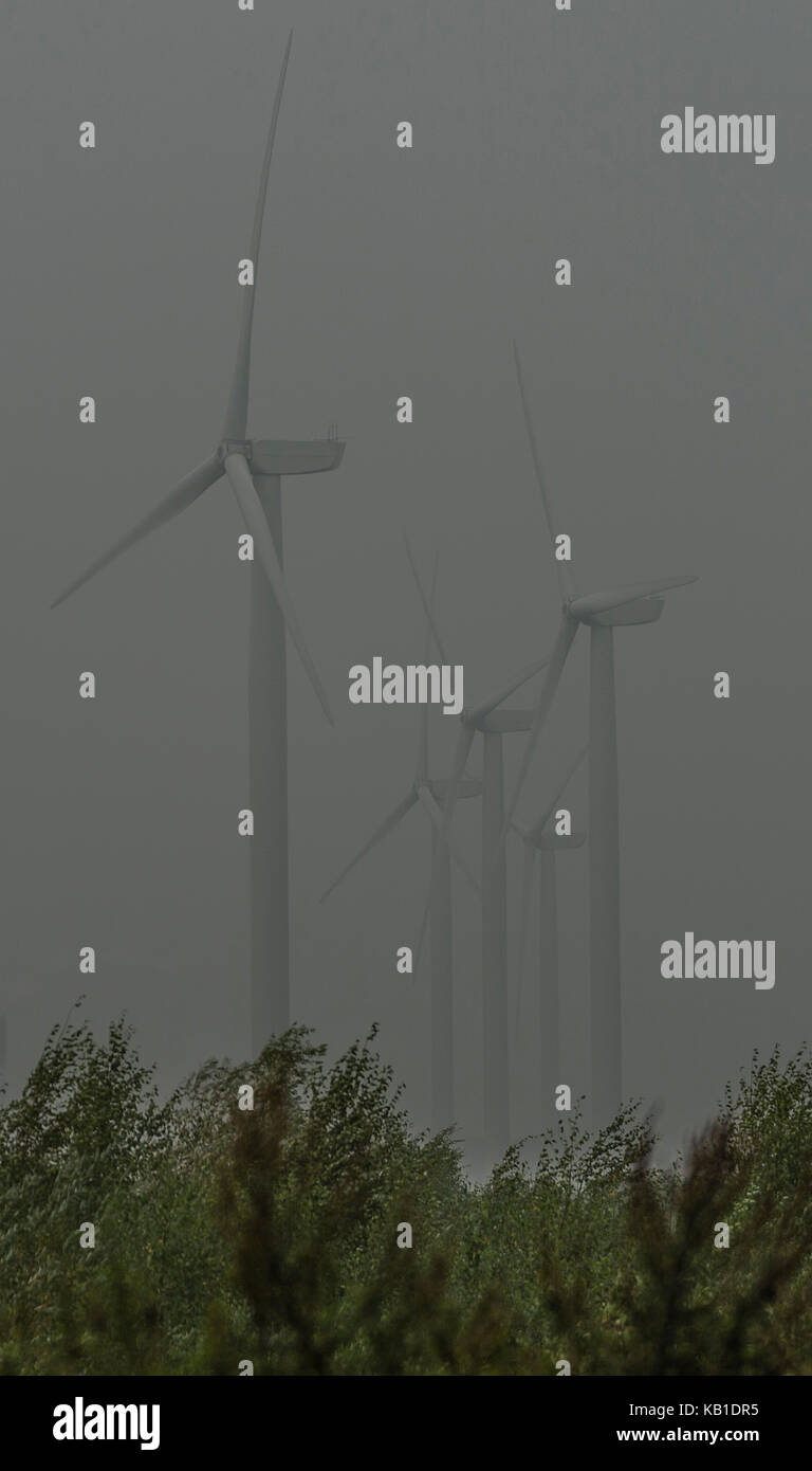 wind turbines in fog Stock Photo - Alamy