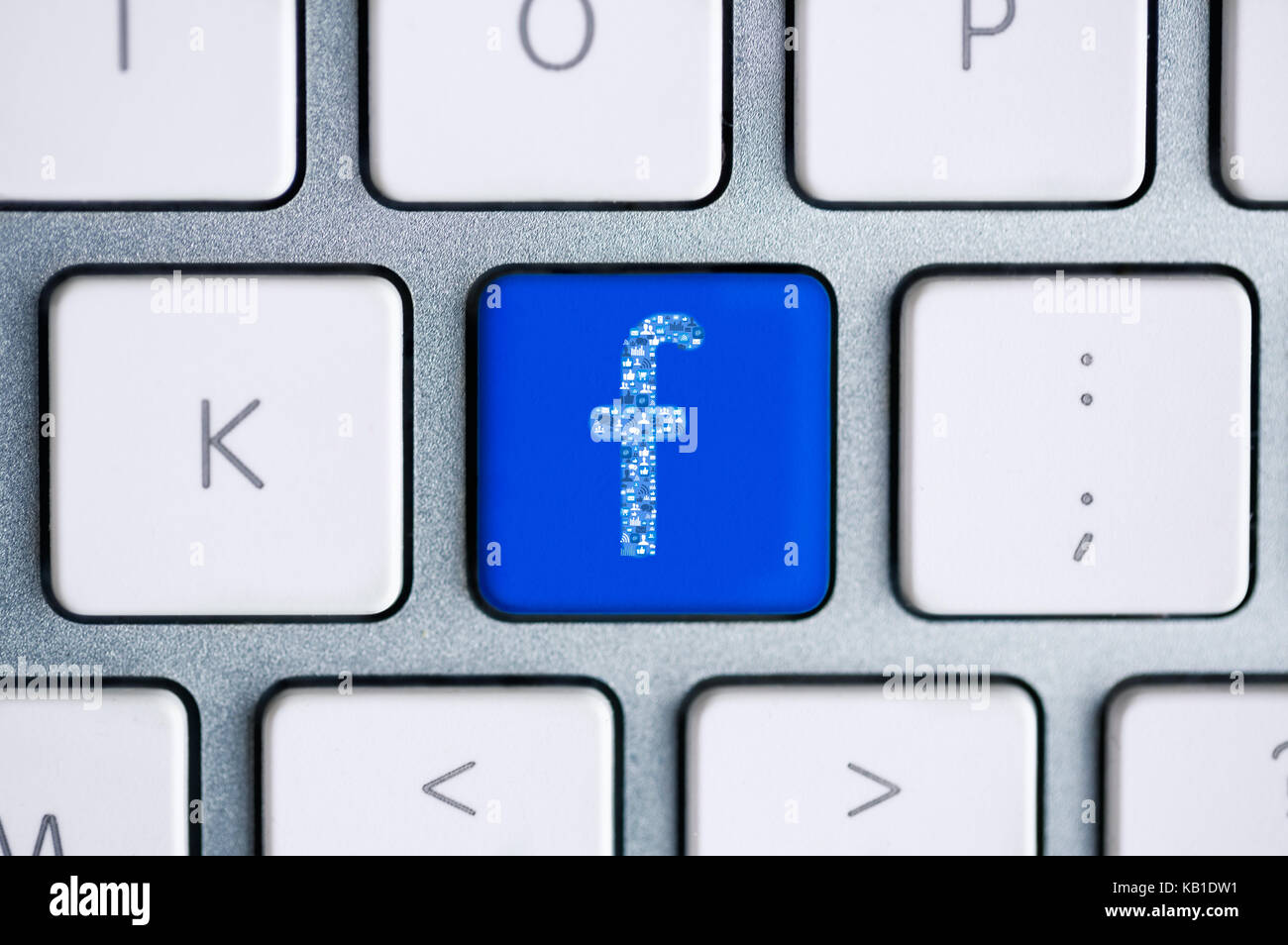 keyboard with blue social network button Stock Photo - Alamy