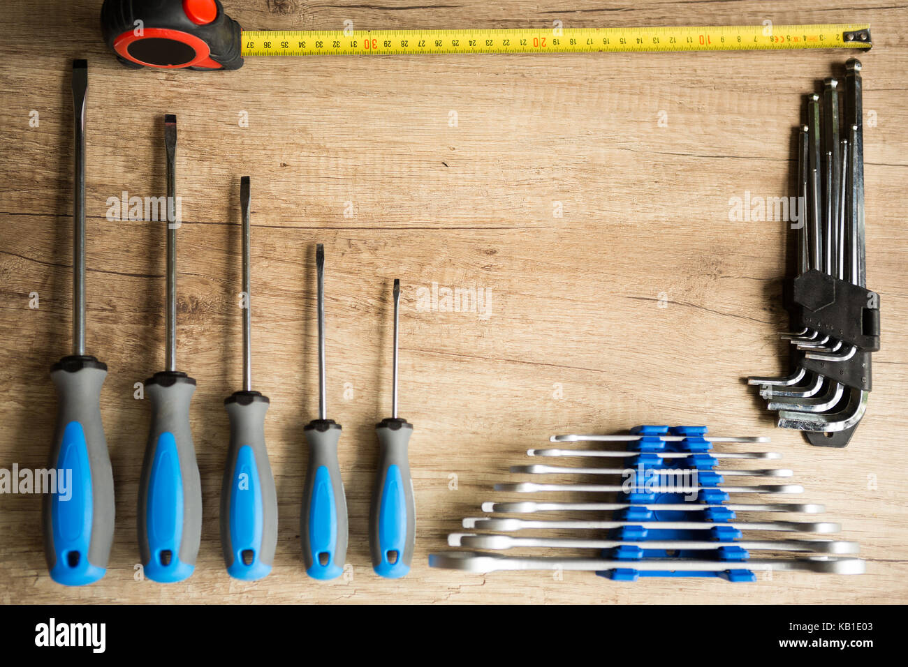 Set of different construction tools on a wooden background Stock Photo ...