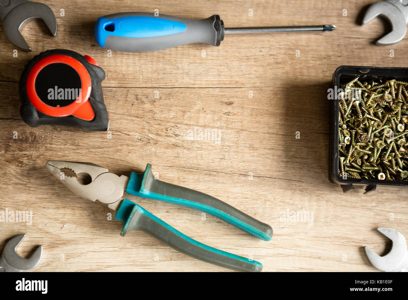 construction tools on wooden desk Stock Photo - Alamy