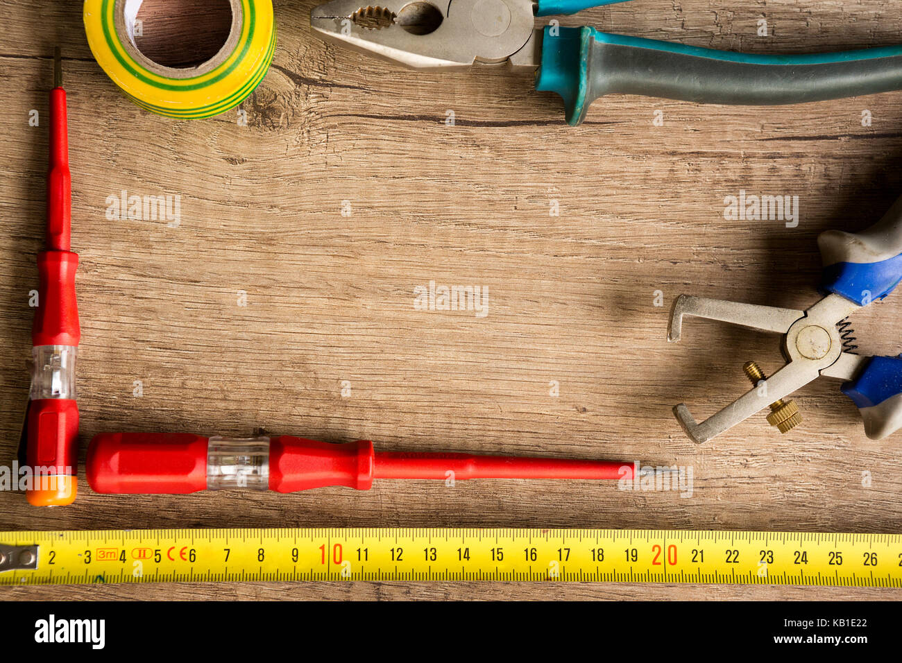 different construction tools on wooden background Stock Photo - Alamy