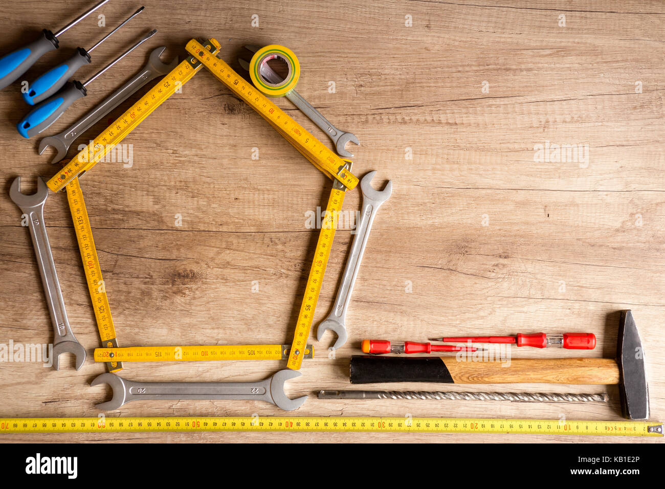 different tools on the wood plank, construction background Stock Photo ...