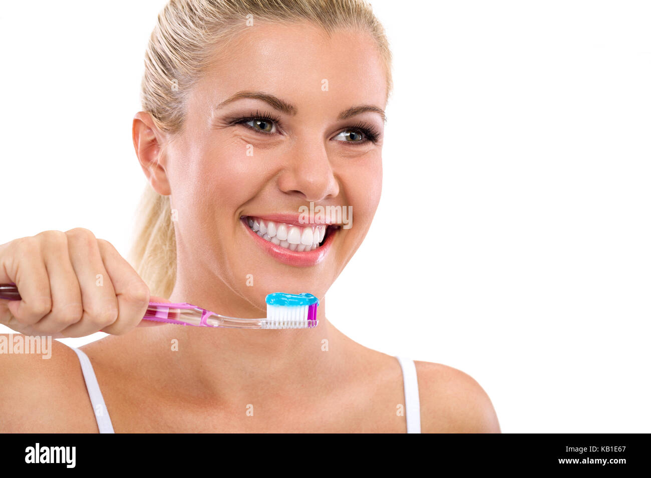 Beautiful smiling girl brushing healthy teeth Stock Photo - Alamy Beautiful smiling girl brushing healthy teeth Stock Photo - Alamy