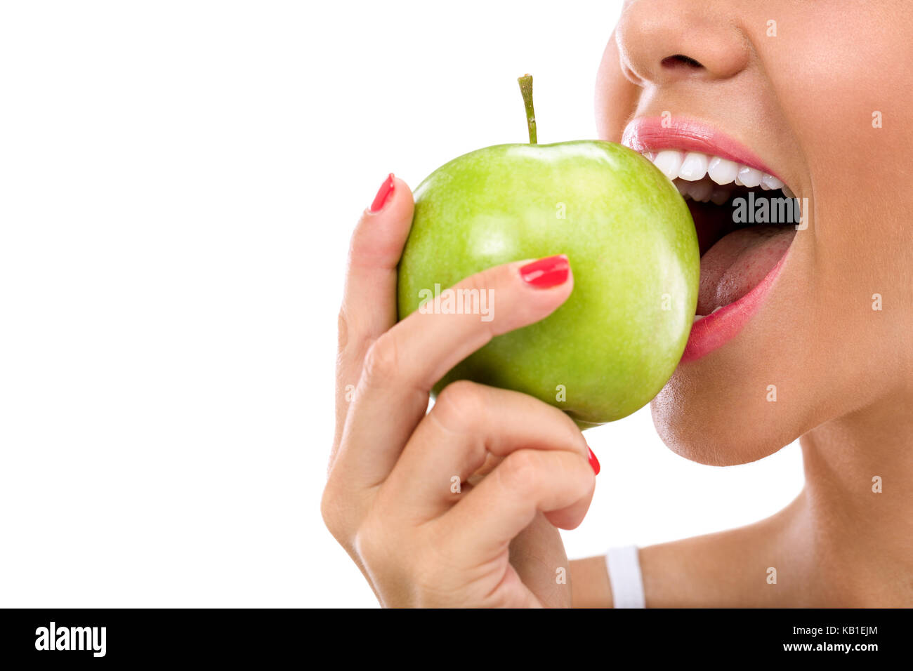 woman biting a green apple isolated on white Stock Photo - Alamy