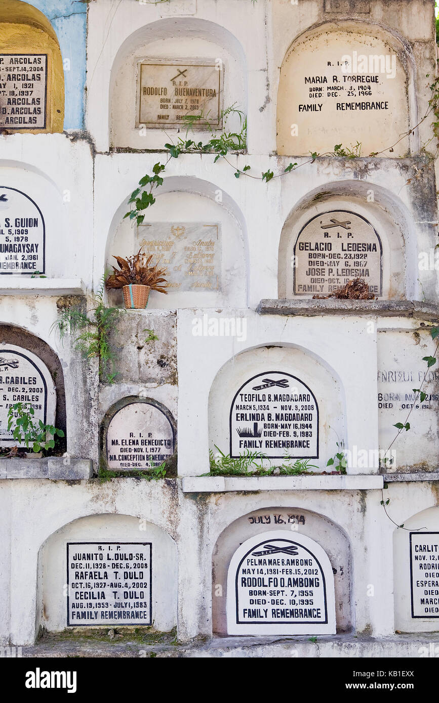 Above ground concrete tombs are stacked many levels hight in Bacolod ...