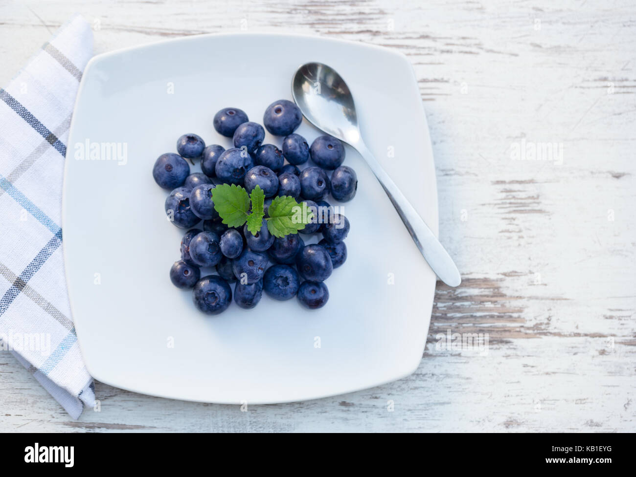 Blueberries on plate, healthy eating Stock Photo - Alamy