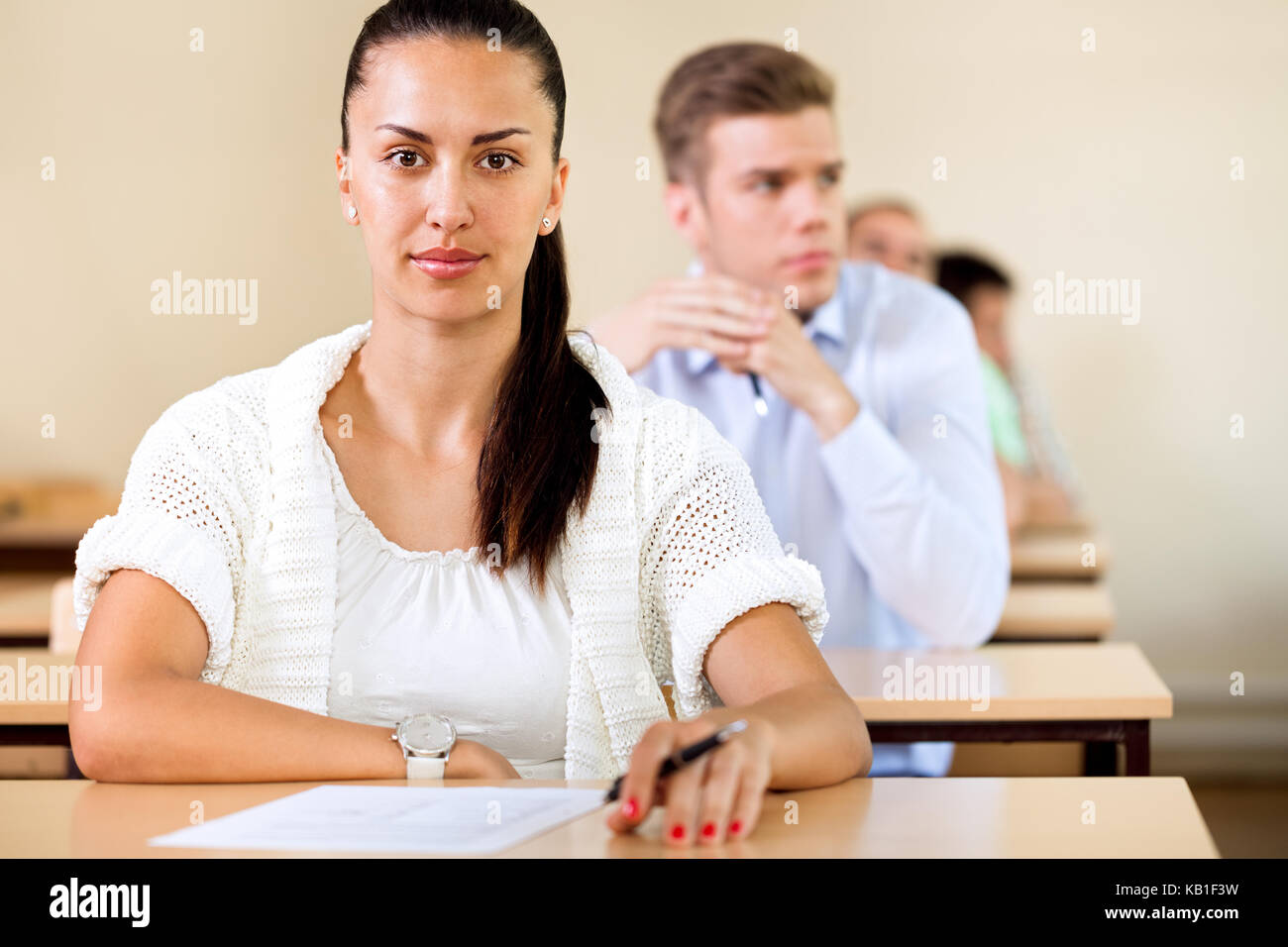 Student sitting at the classroom Stock Photo - Alamy