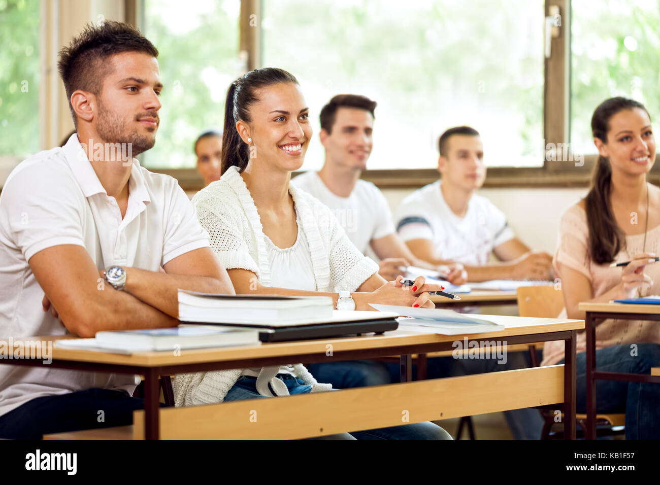 College students listening to a university lecture Stock Photo - Alamy