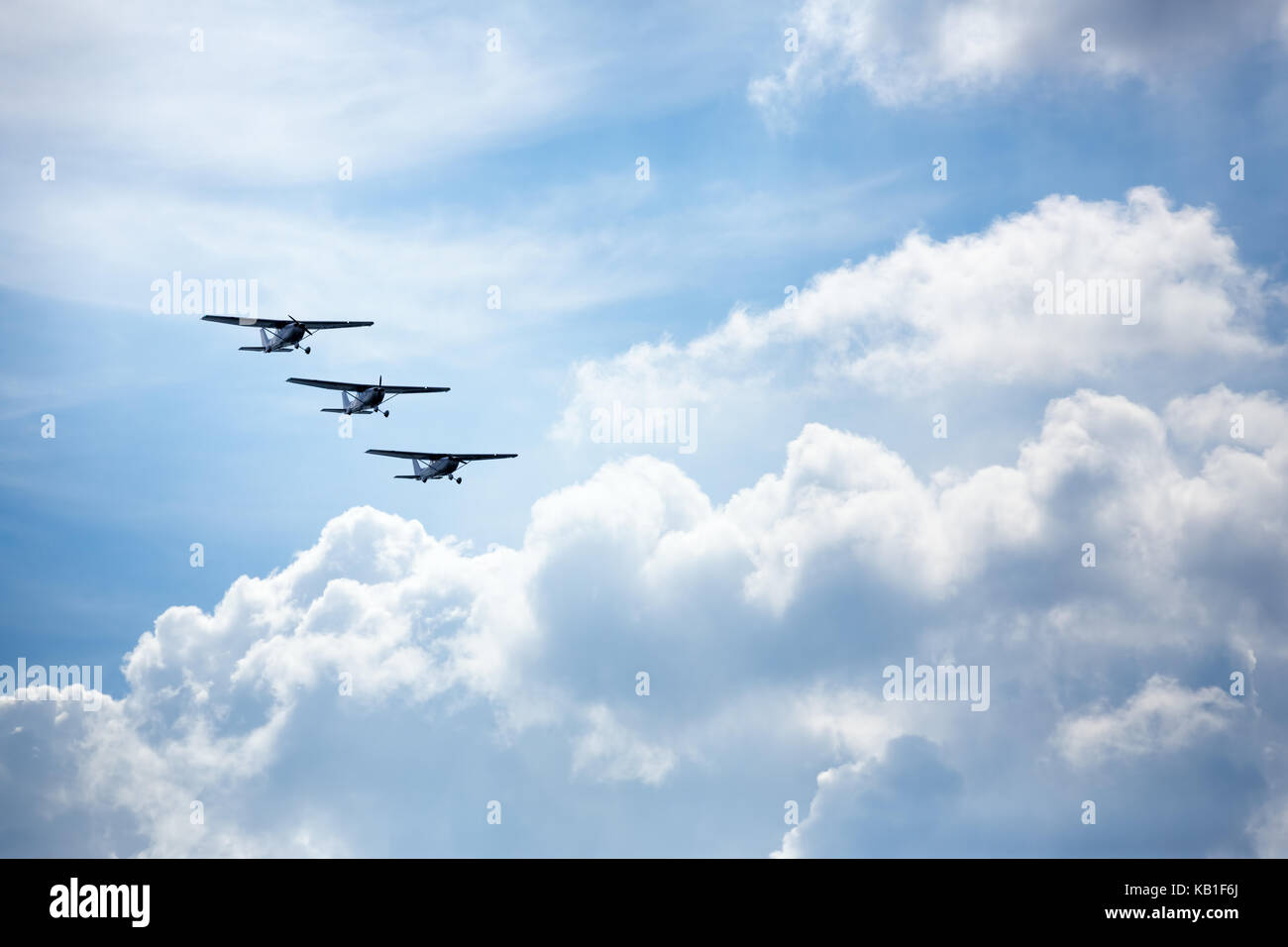 Three airplane flying on air show together Stock Photo - Alamy