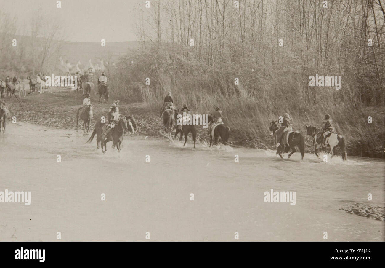 Untitled (Native Americans fording river Stock Photo - Alamy