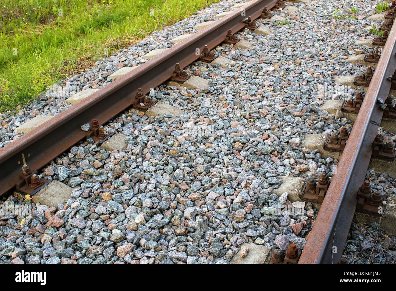 Rusty track rails. The railway track itself is new, the rails rust from ...