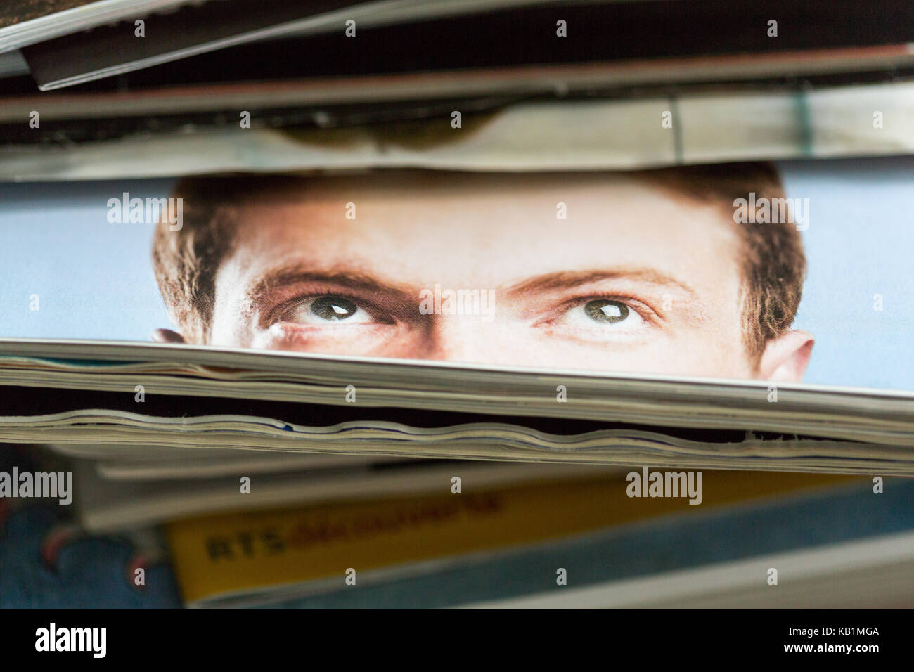Eyes and newspaper hi-res stock photography and images - Alamy