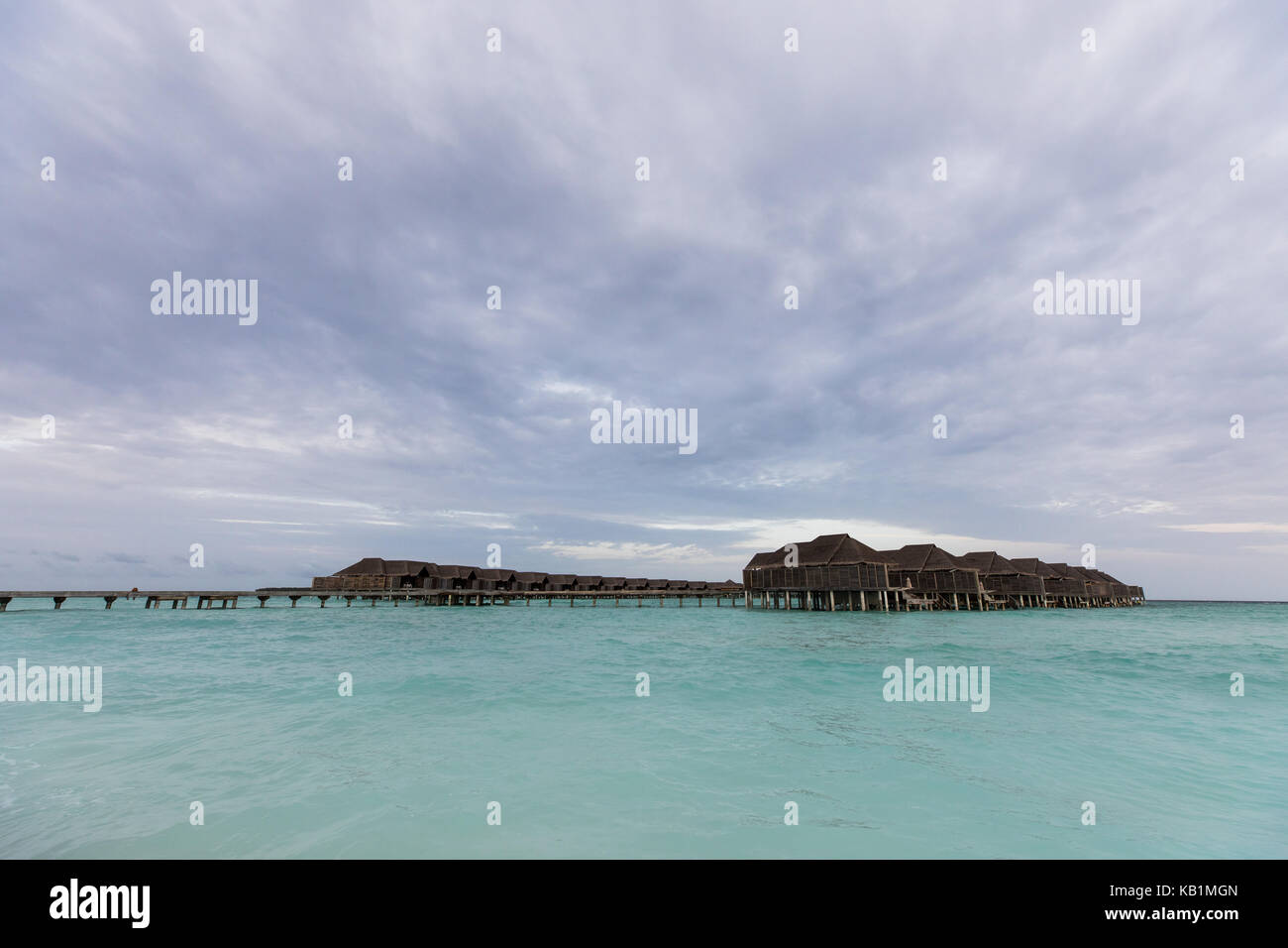 View of a tropical resort at sunrise. Maldives Stock Photo - Alamy