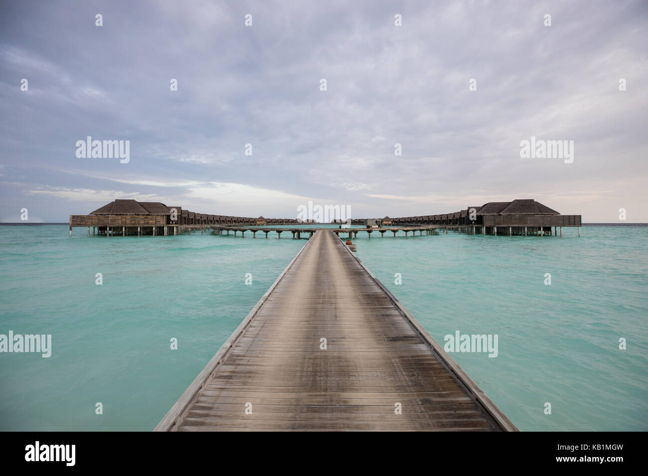 View of a tropical resort at sunrise. Maldives Stock Photo - Alamy