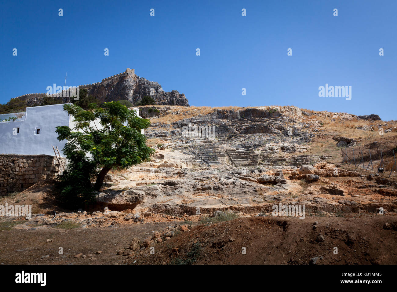The remains of the amphitheatre in Lindos on the Greek island of Rhodes ...