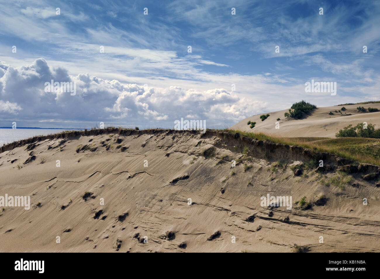 Lithuania, Nida, coast, Sand dunes with grass, sky, clouds Stock Photo ...